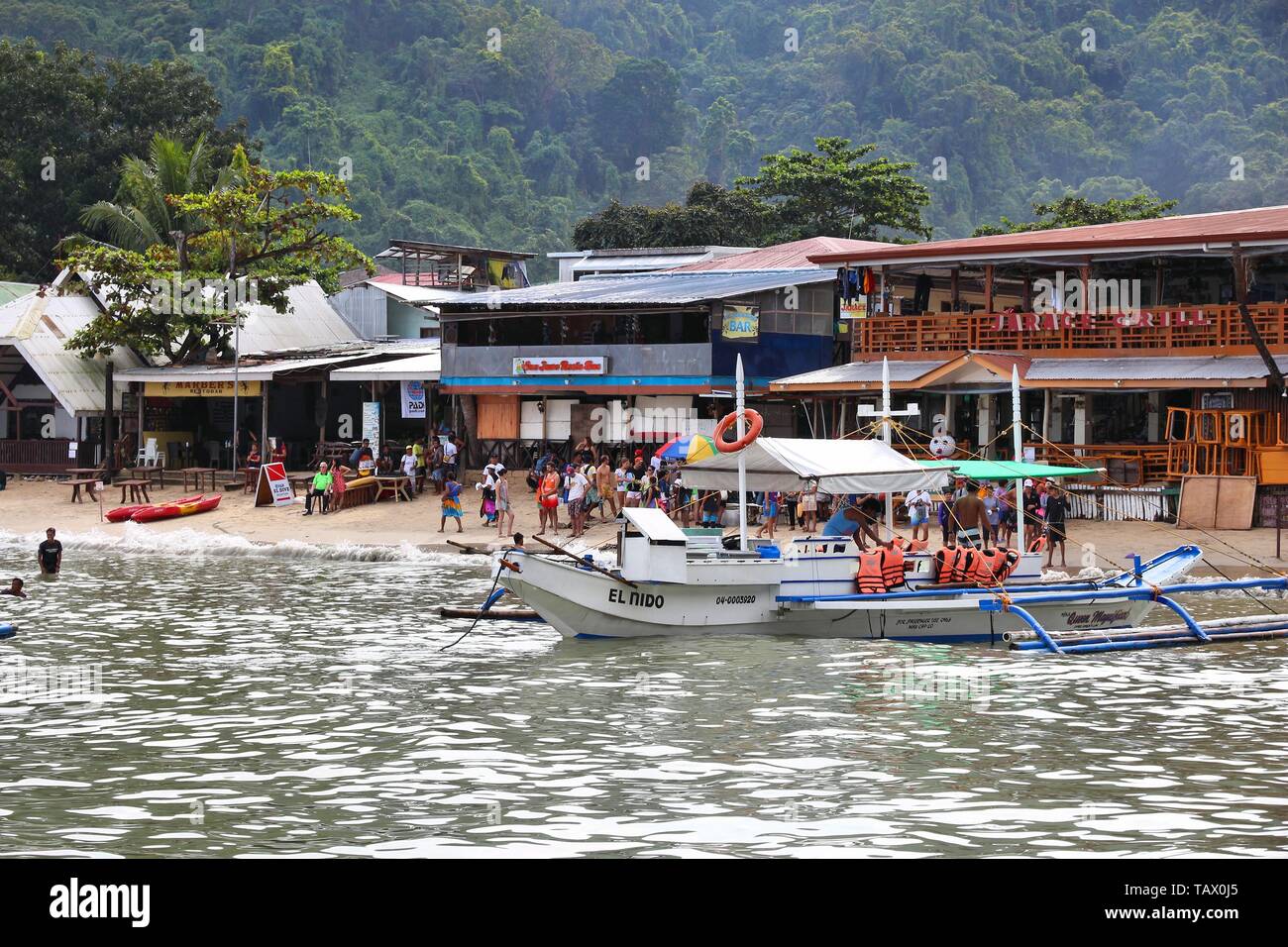 PALAWAN, PHILIPPINES - DECEMBER 4, 2017: People visit tourist resort ...