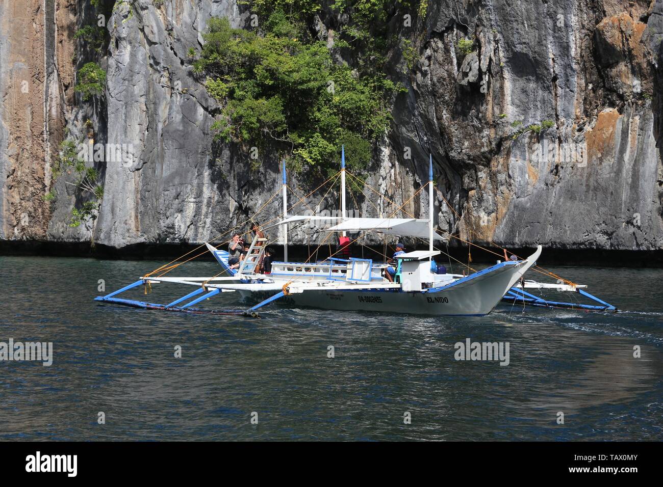 PALAWAN, PHILIPPINES - DECEMBER 1, 2017: People enjoy island hopping ...