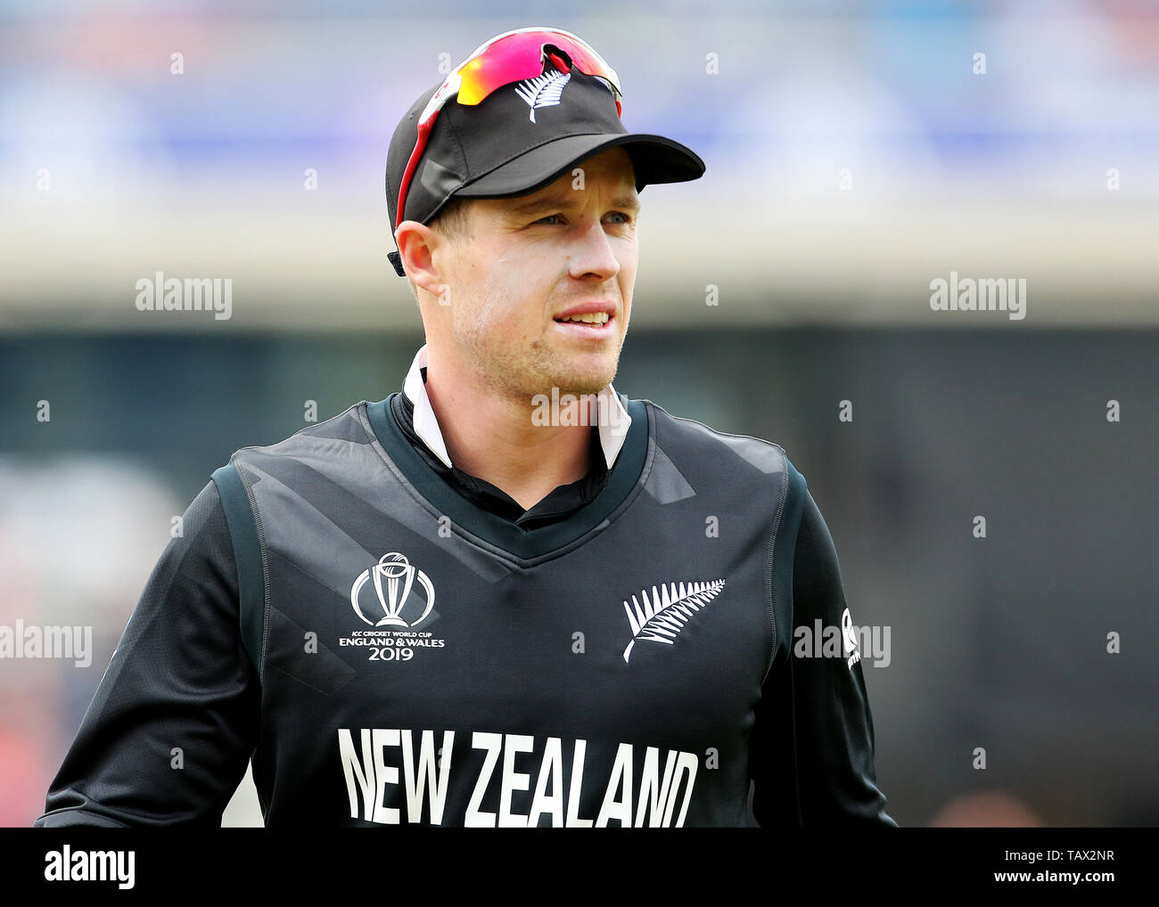 New Zealand's Henry Nicholls moves into his fielding position during ...