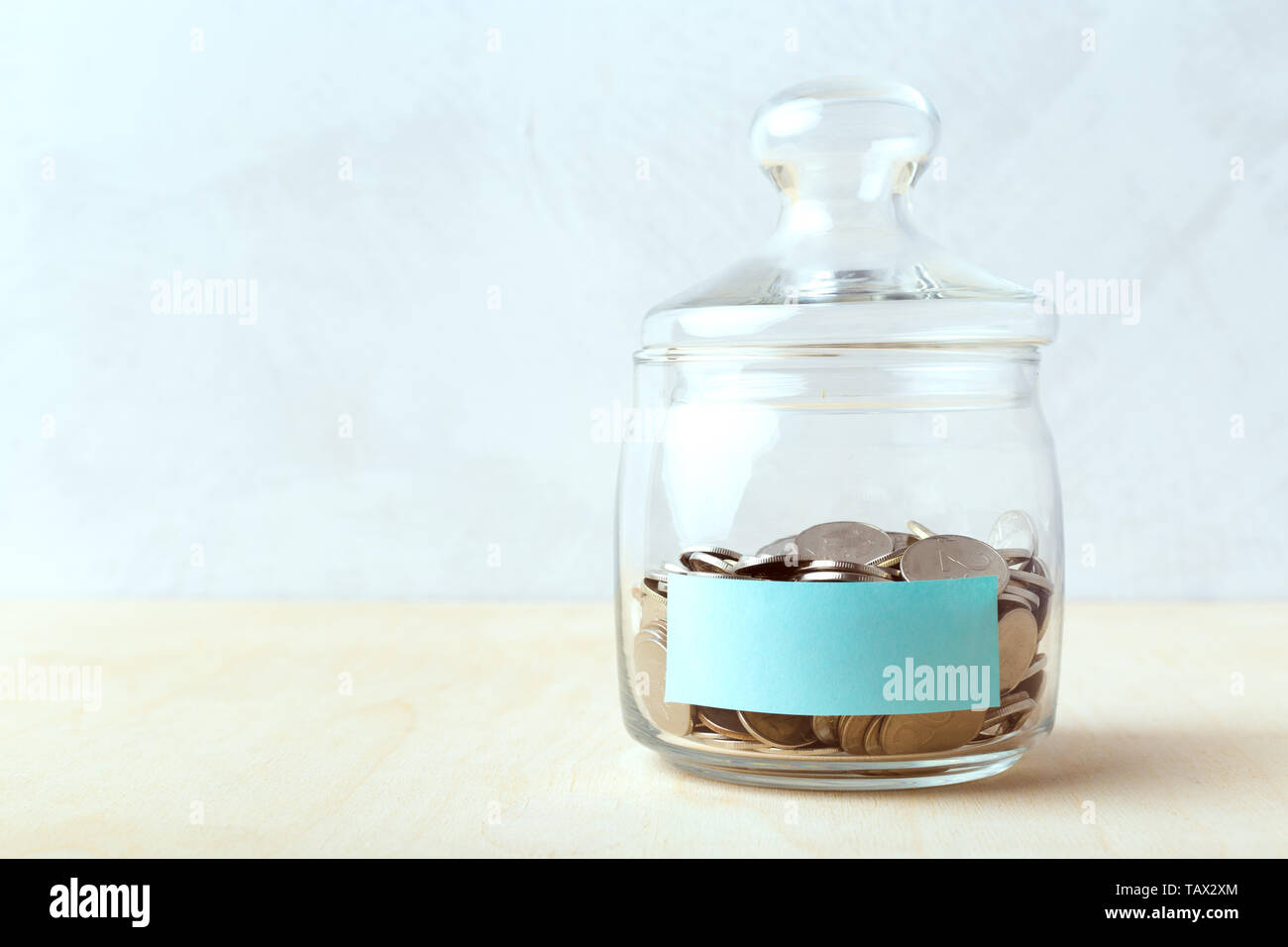 Coins in Glass Bottles, Savings Money Ideas Stock Photo - Alamy