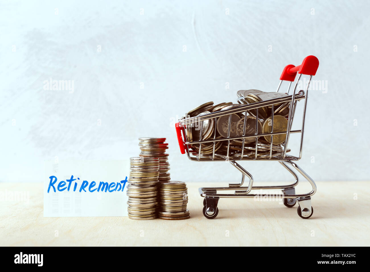 Saving Money Concept. Shopping trolley or cart with coin Stock Photo ...