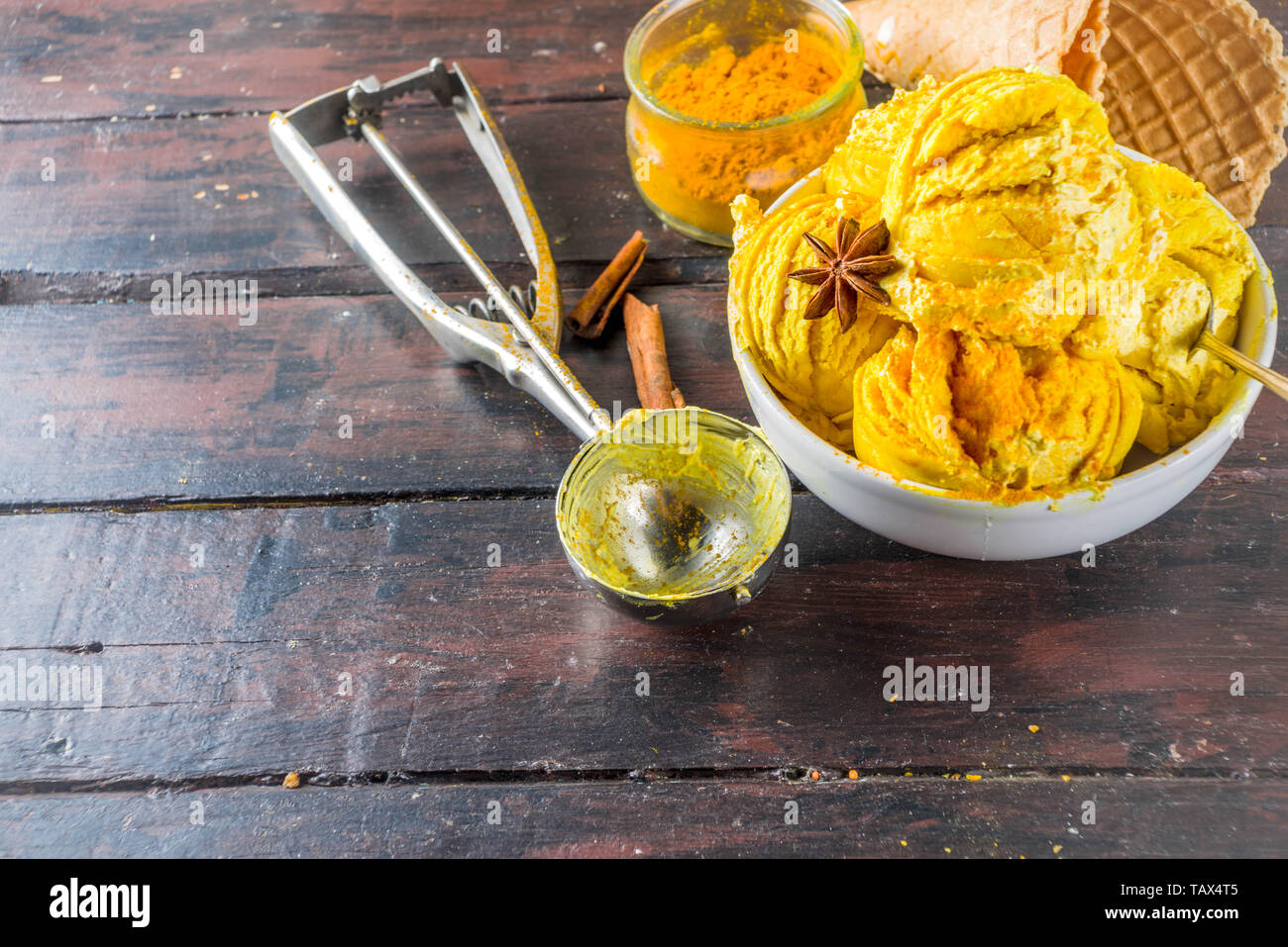 Trendy food and drink. Organic vegan dessert. Golden colored cinnamon ...
