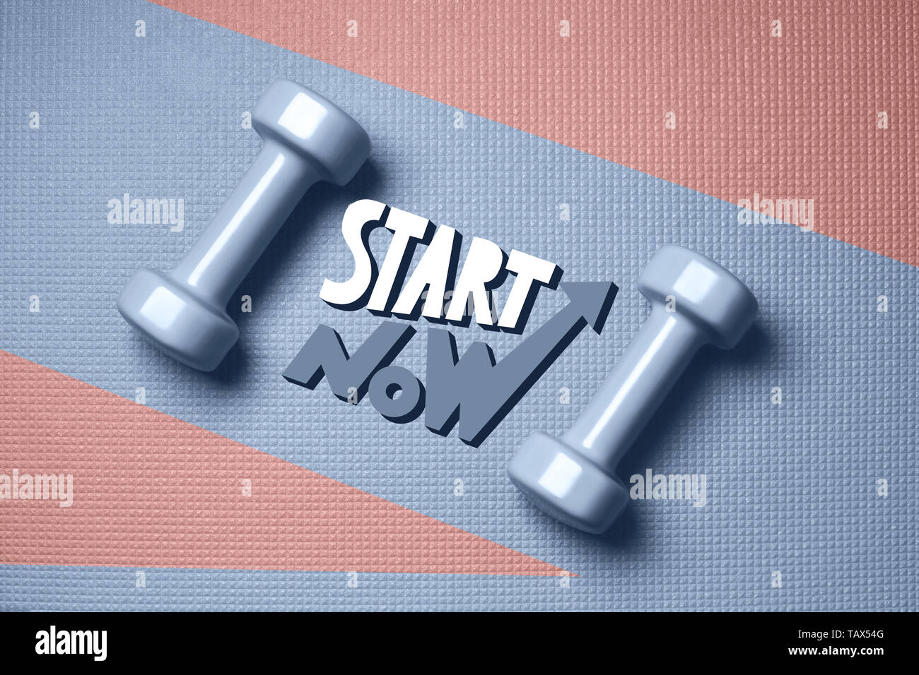 Skyway color dumbbells on the mat with Start now motivational slogan ...