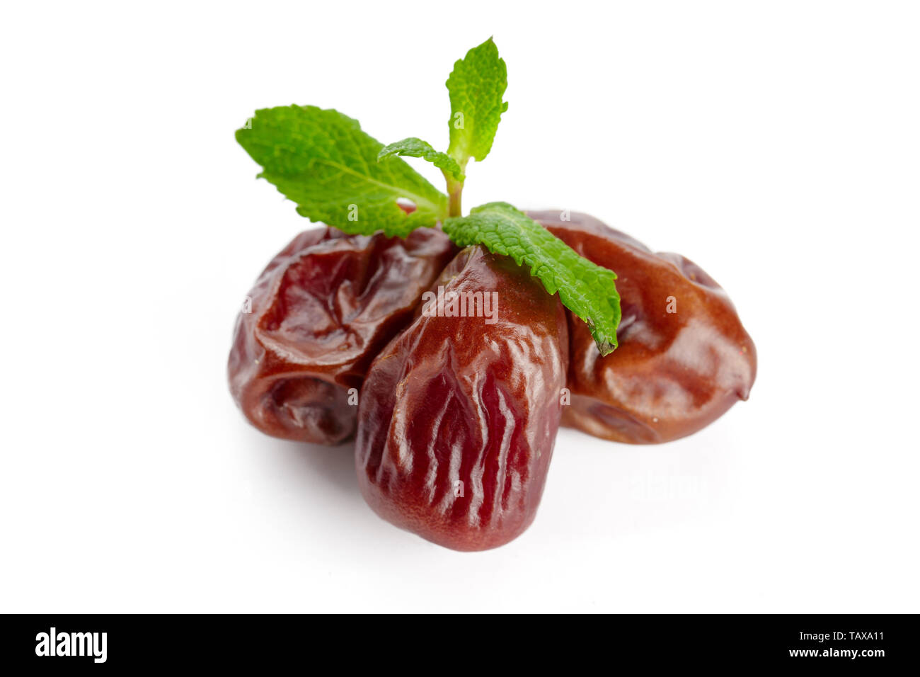 date fruit isolated on white Stock Photo - Alamy