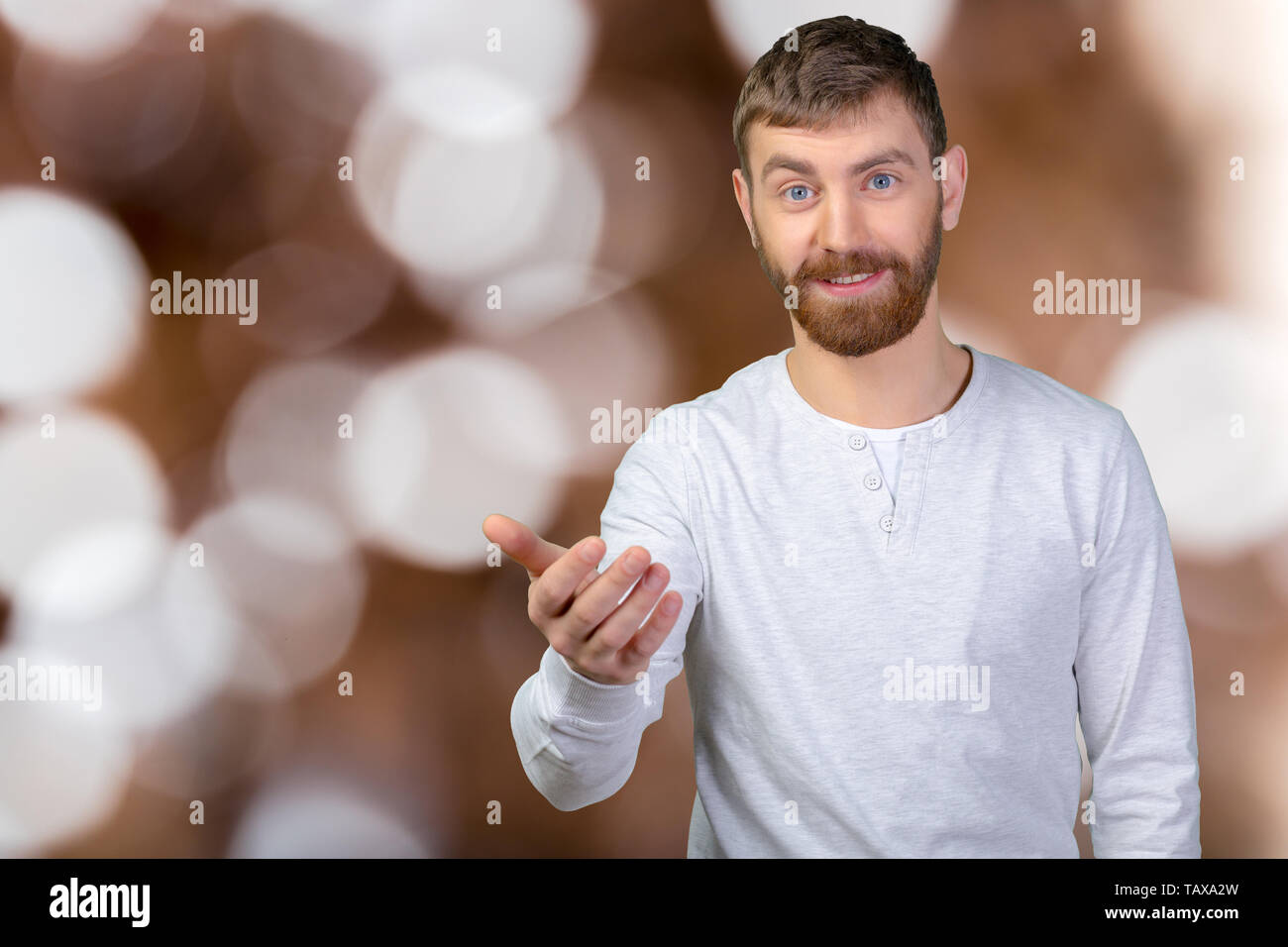 Beckoning sign hi-res stock photography and images - Alamy