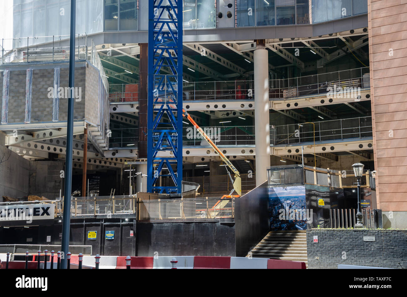 A building under construction in the financial district of The City of ...