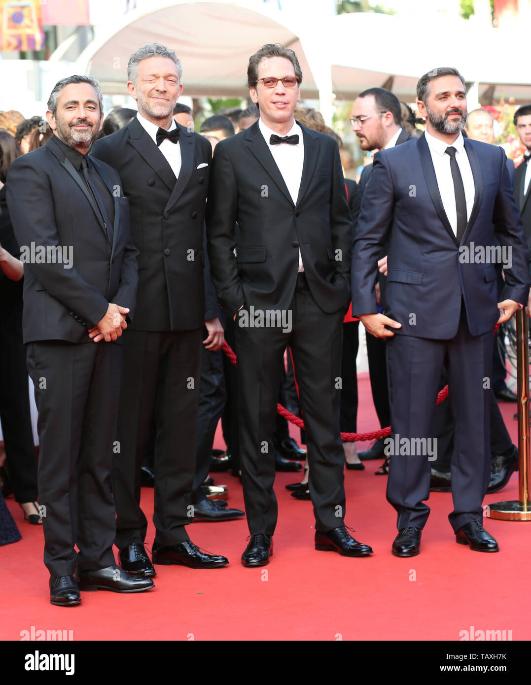 CANNES, FRANCE - MAY 25: Reda Kateb, Olivier Nakache, Eric Toledano and ...