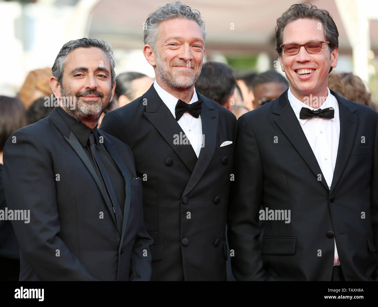 CANNES, FRANCE - MAY 25: Reda Kateb, Olivier Nakache, Eric Toledano and ...