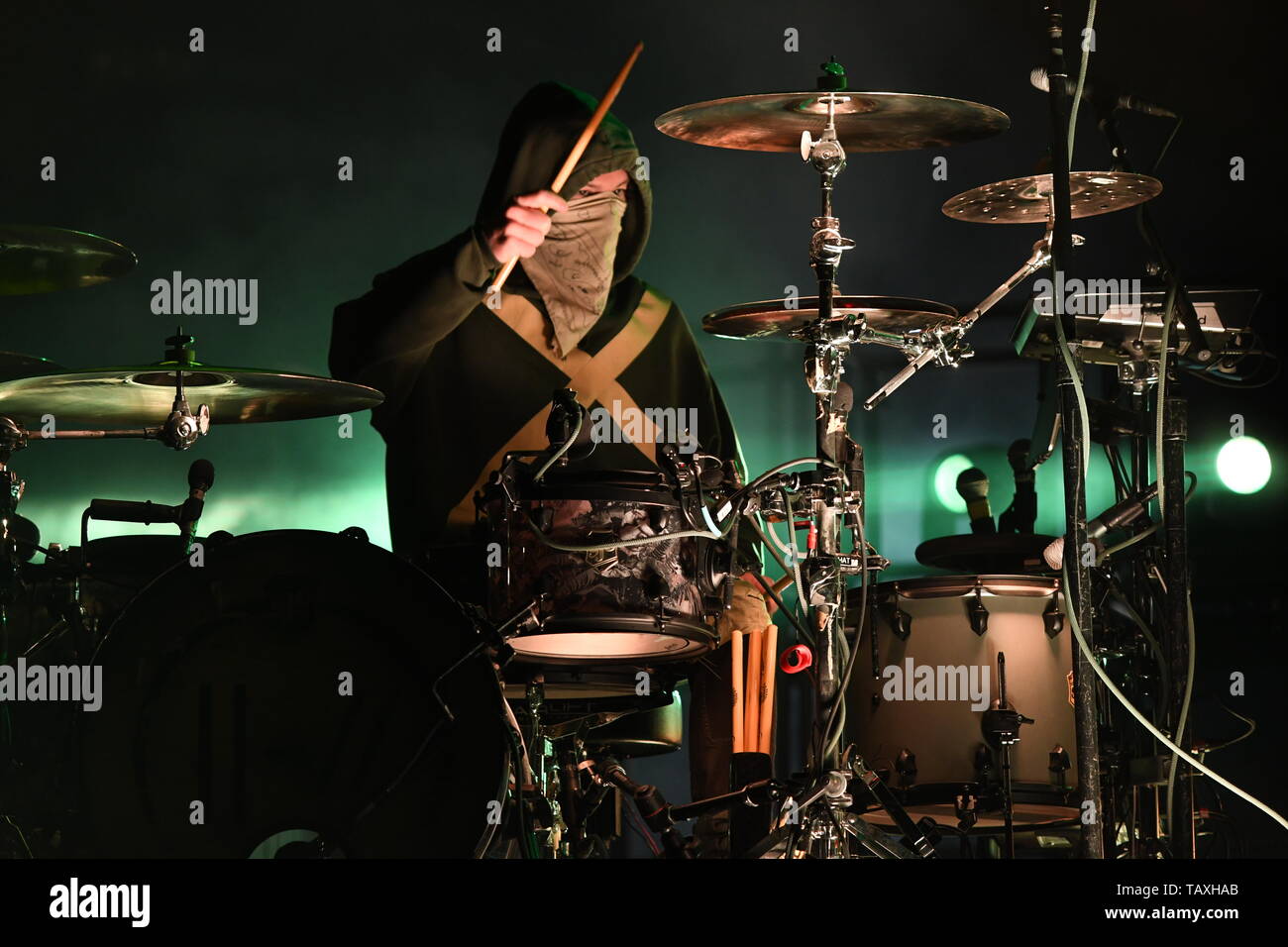 Drummer Josh Dun is shown performing on stage during a "live" stand up ...