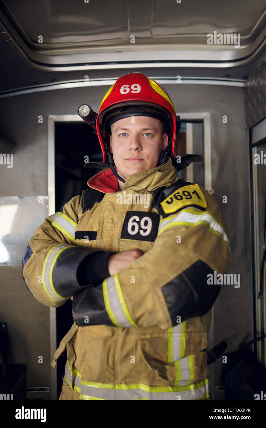 Image of man fireman on background of fire truck Stock Photo - Alamy