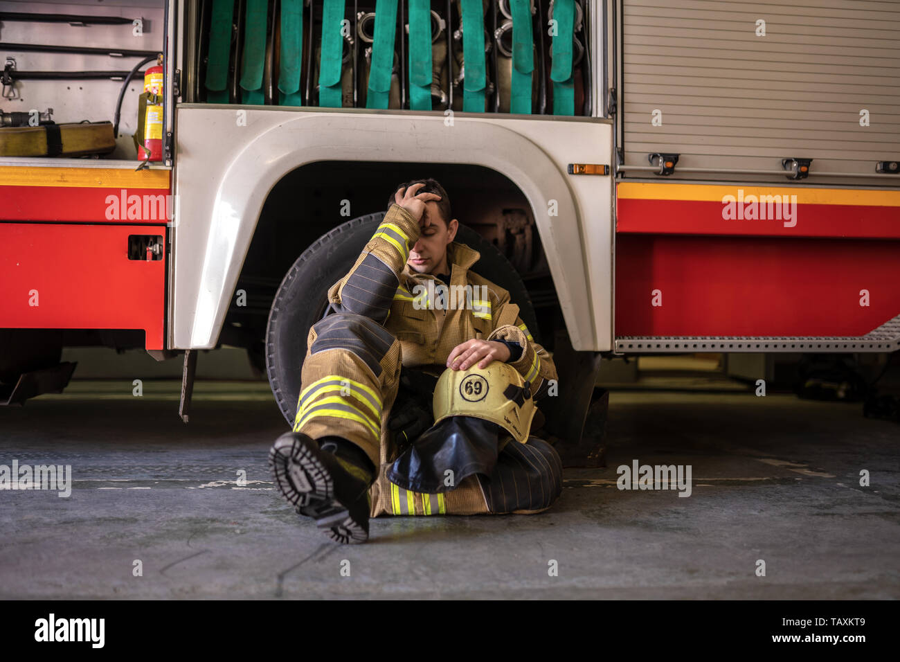 Tired firefighter hi-res stock photography and images - Alamy