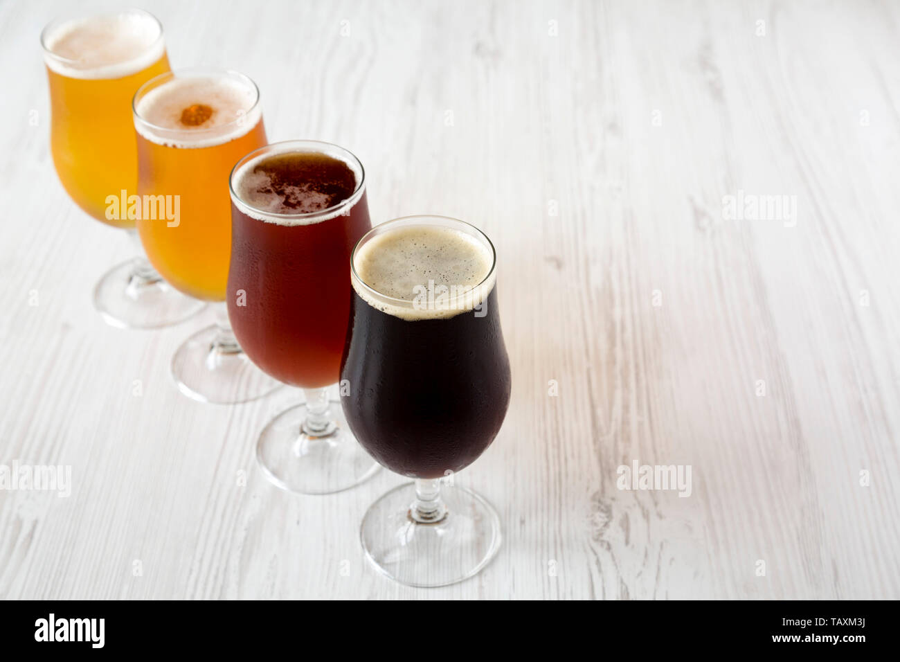 Different beers, side view. Close-up. Copy space Stock Photo - Alamy