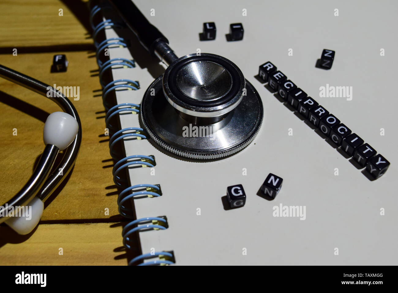 reciprocity on wooden blocks isolated table background. Inspiration ...