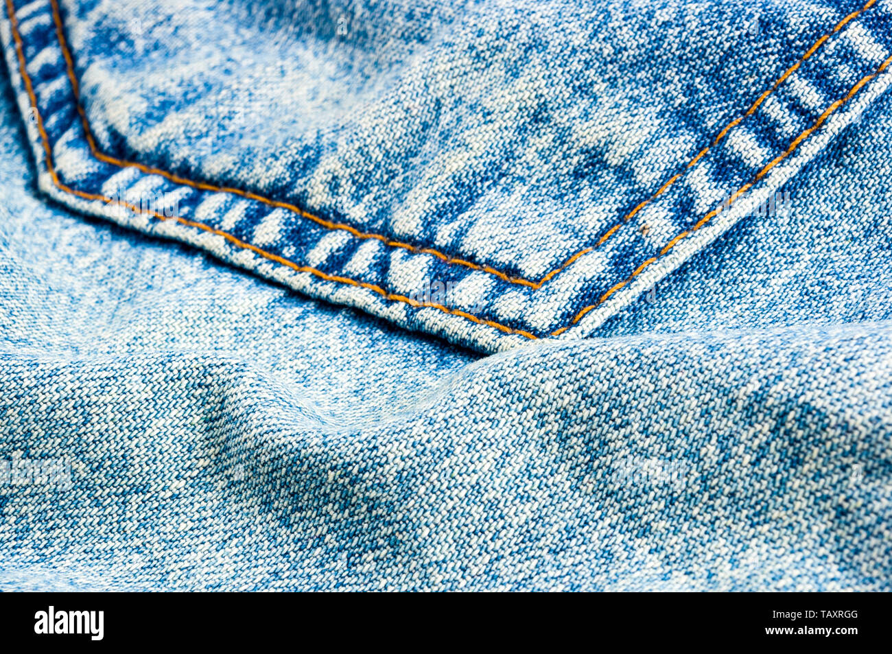 clothing items blue washed faded jeans cotton fabric texture with seams ...