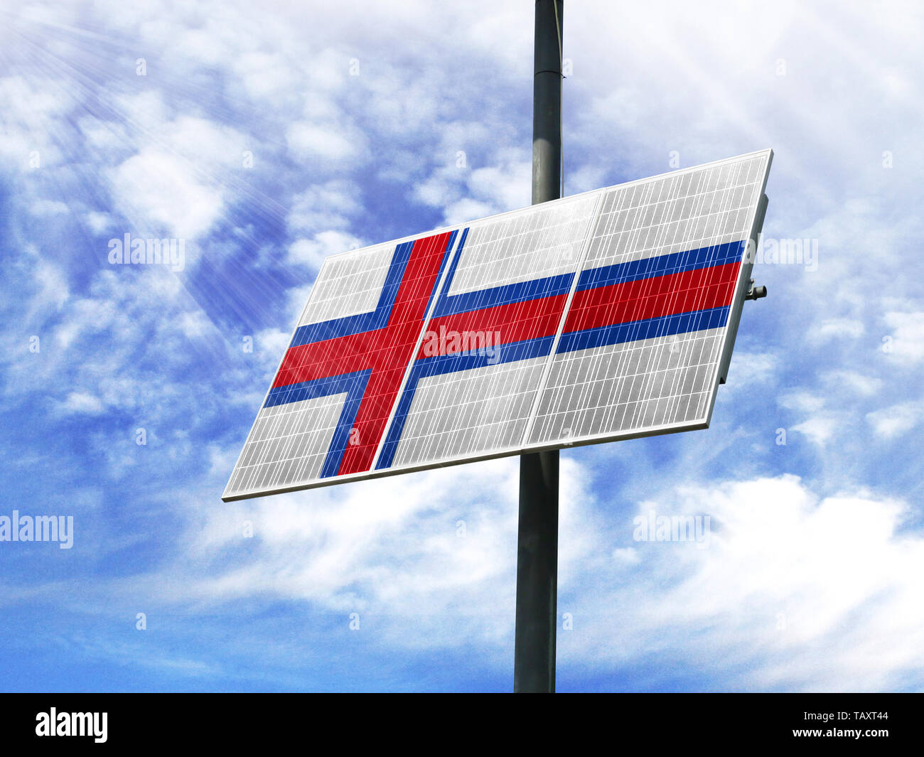 Solar panels against a blue sky with a picture of the flag of Faroe ...