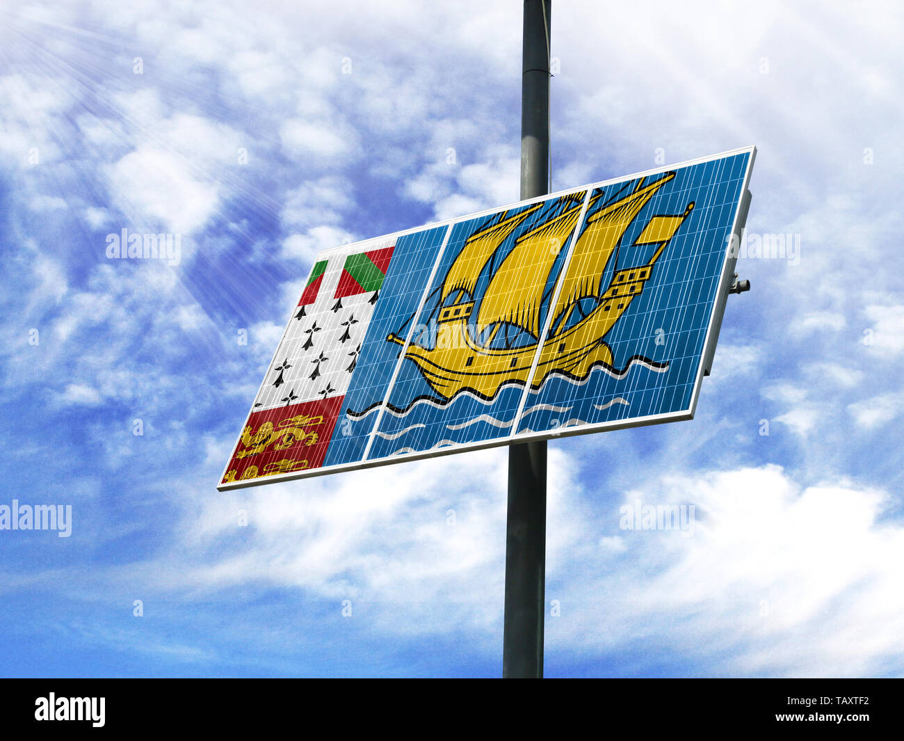 Solar panels against a blue sky with a picture of the flag of Saint ...