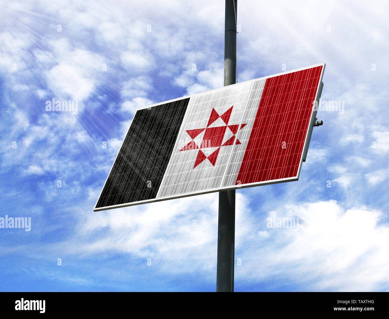 Solar panels against a blue sky with a picture of the flag of Udmurtia ...