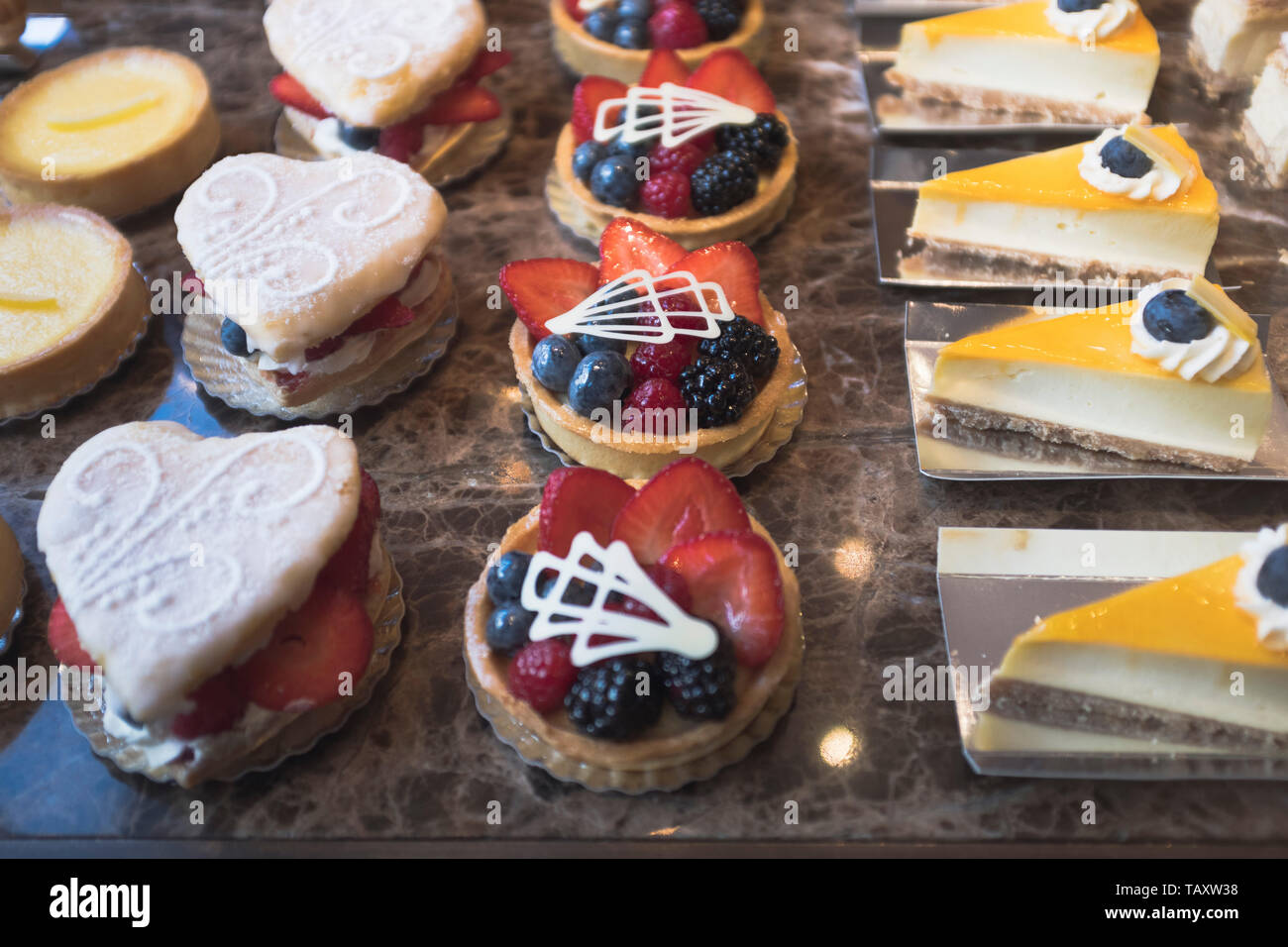 dh Cakes FOOD UK Bettys fruit tarts and cakes Stock Photo - Alamy