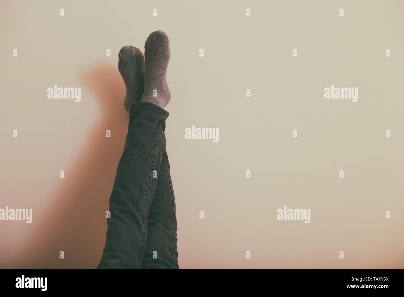 Legs up in air crossed hi-res stock photography and images - Alamy