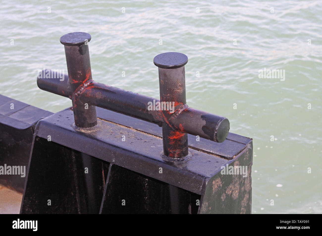 Marine Steel Double Dock Mooring Bitt Bollard at Dock Stock Photo - Alamy