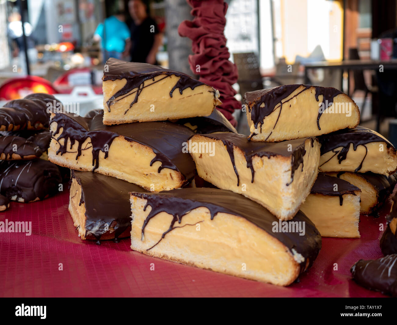 Street stall in a medieval market with food on display for sale to ...