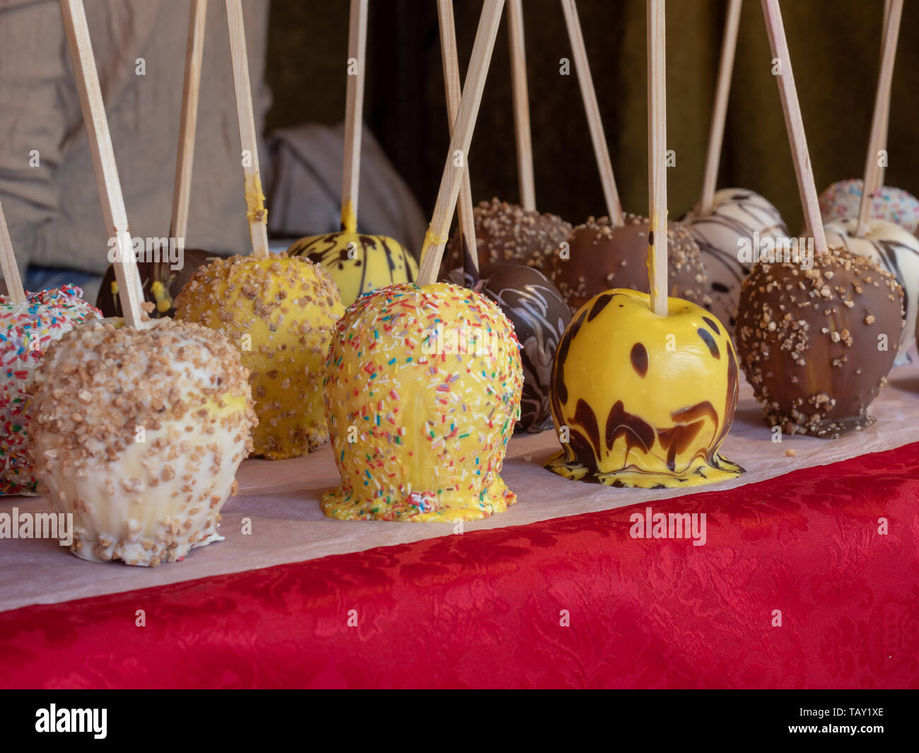Street stall in a medieval market with food on display for sale to ...