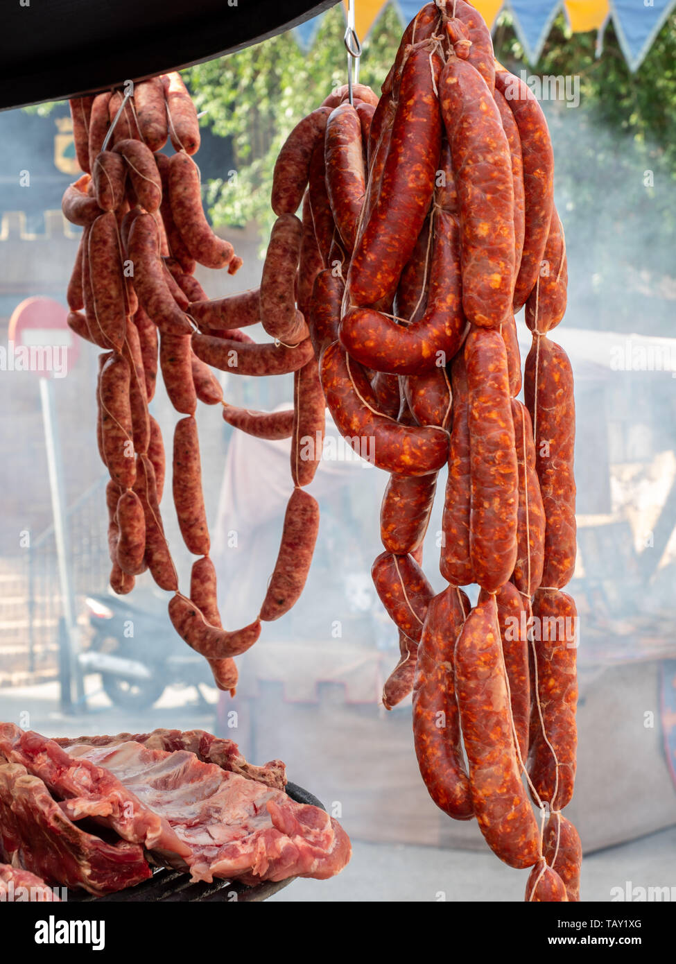Stand of hanging chorizos for their preparation and later consumption ...