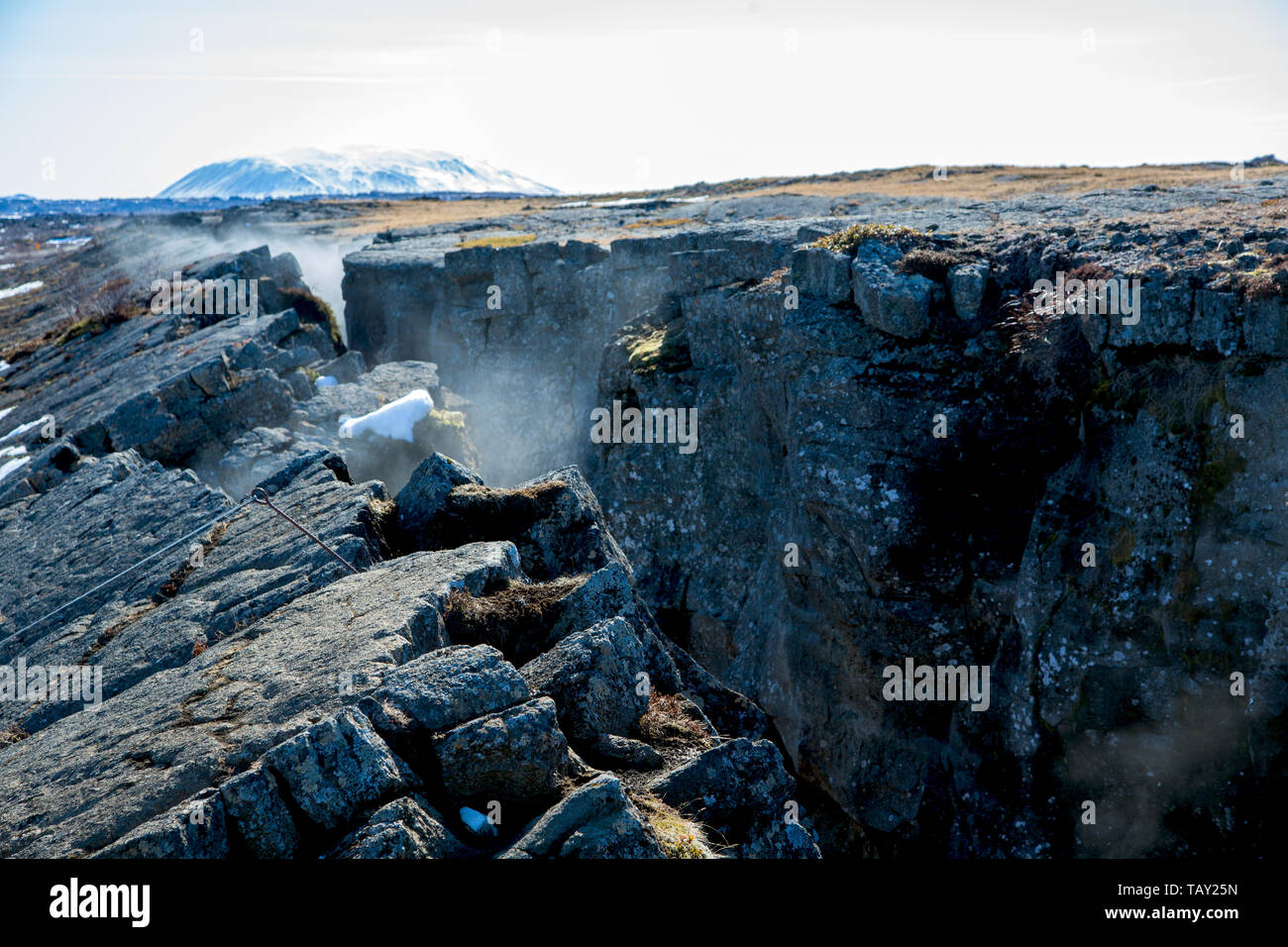 Broken rock by geothermal energy with warm, rising steam Stock Photo ...