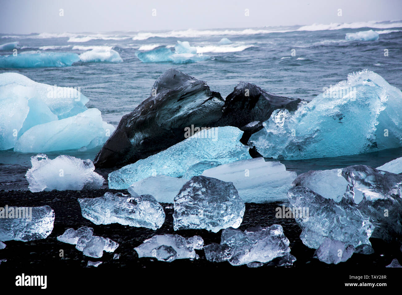 Glacier ice chunGlacier ice chunks on Diamond Beach from ...