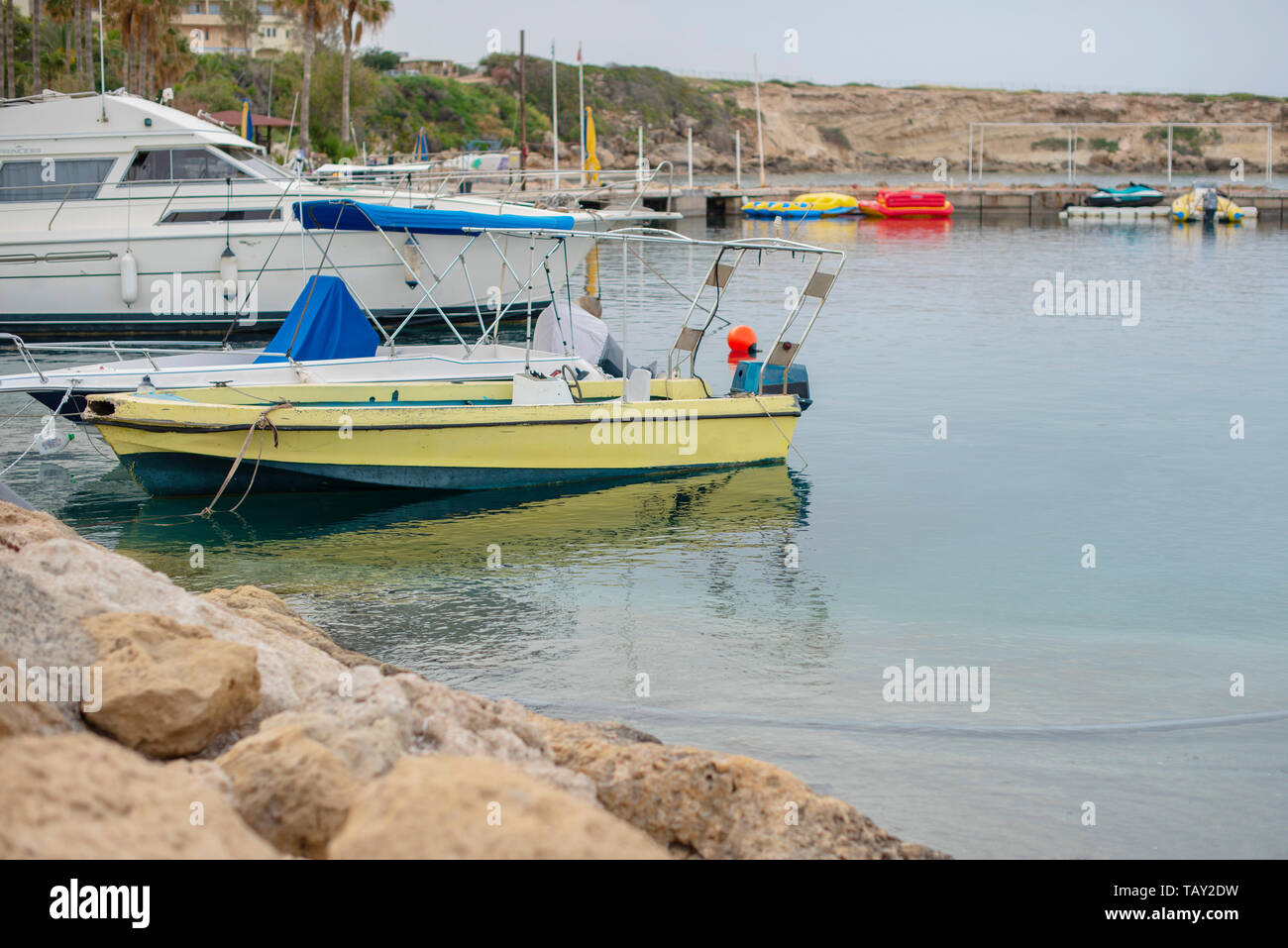 fishing boat preparing to sail Stock Photo - Alamy