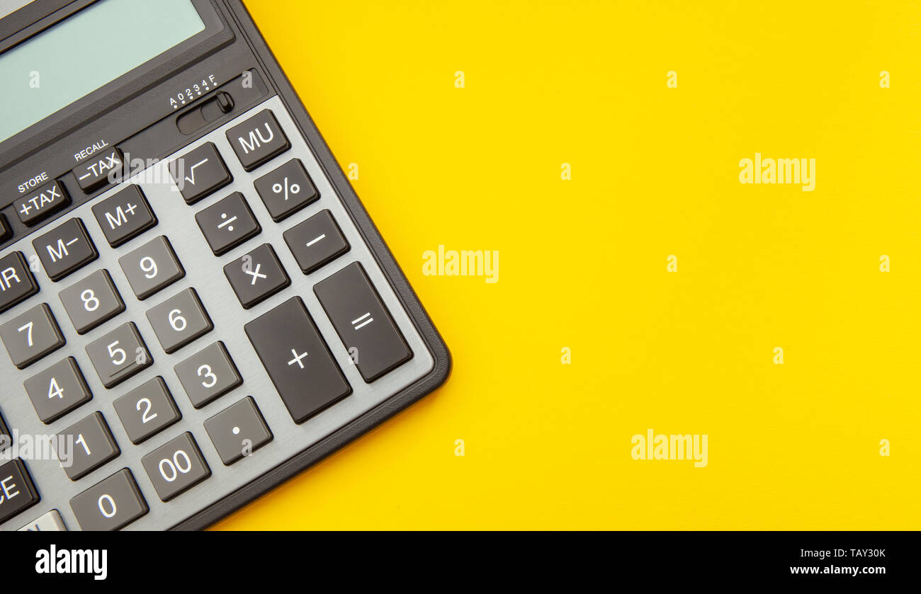 Modern calculator, Business and Finance accounting concept on yellow ...