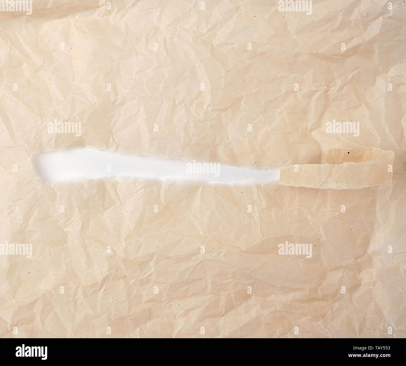 Torn off wrapping paper hi-res stock photography and images - Alamy