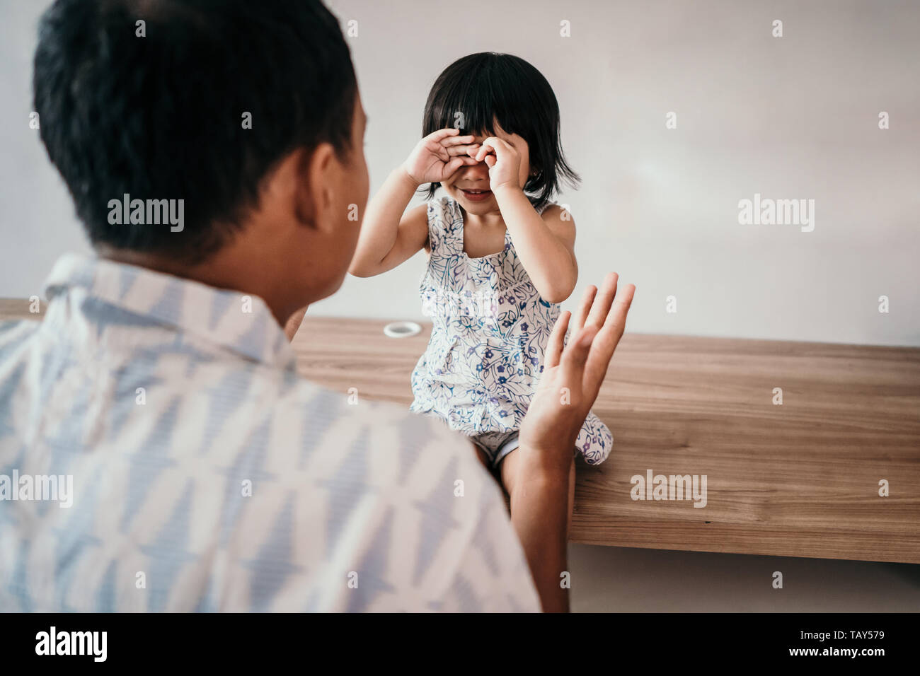 businessman angry at her daughter while working in home office Stock ...