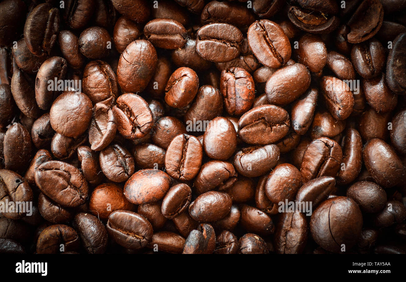 Close up of Coffee beans roasted texture background - top view Stock ...