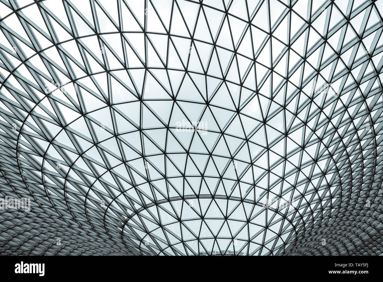 Glass and steel building with triangle pattern structure. Futuristic ...