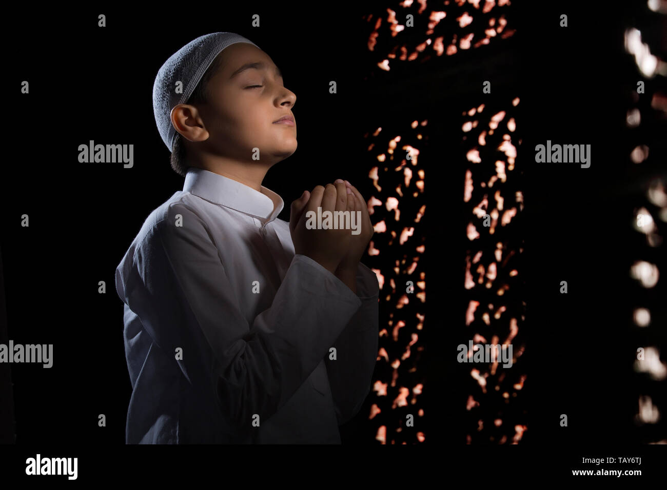 Muslim Boy praying Stock Photo - Alamy