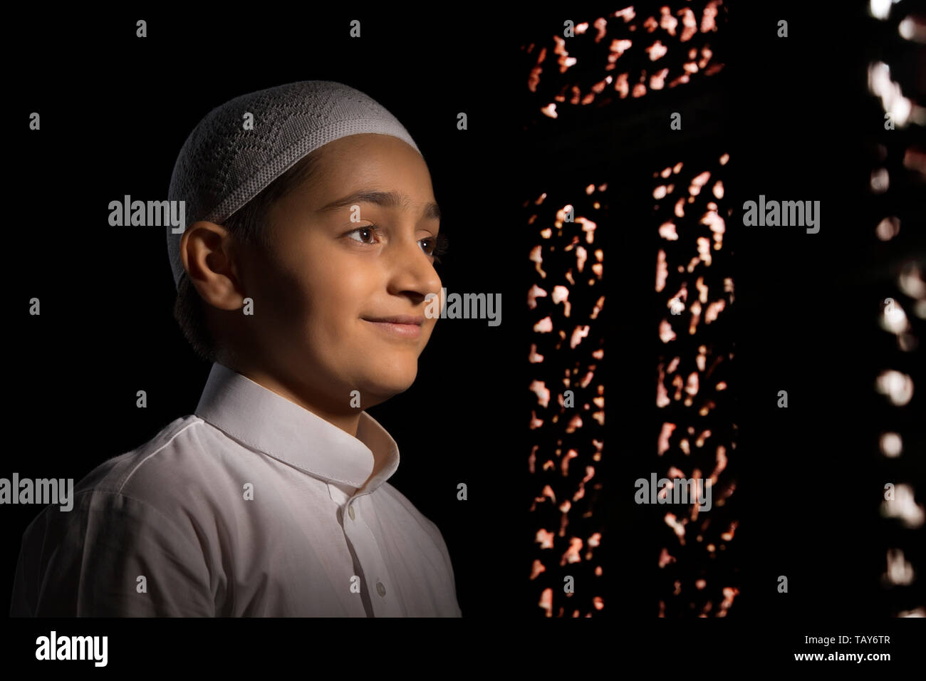 Portrait of a Muslim boy smiling Stock Photo - Alamy