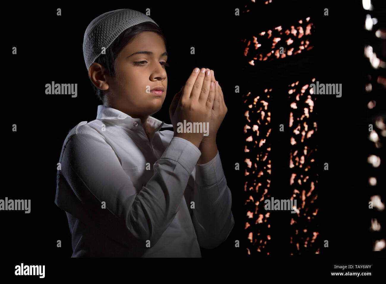 Muslim Boy praying Stock Photo - Alamy