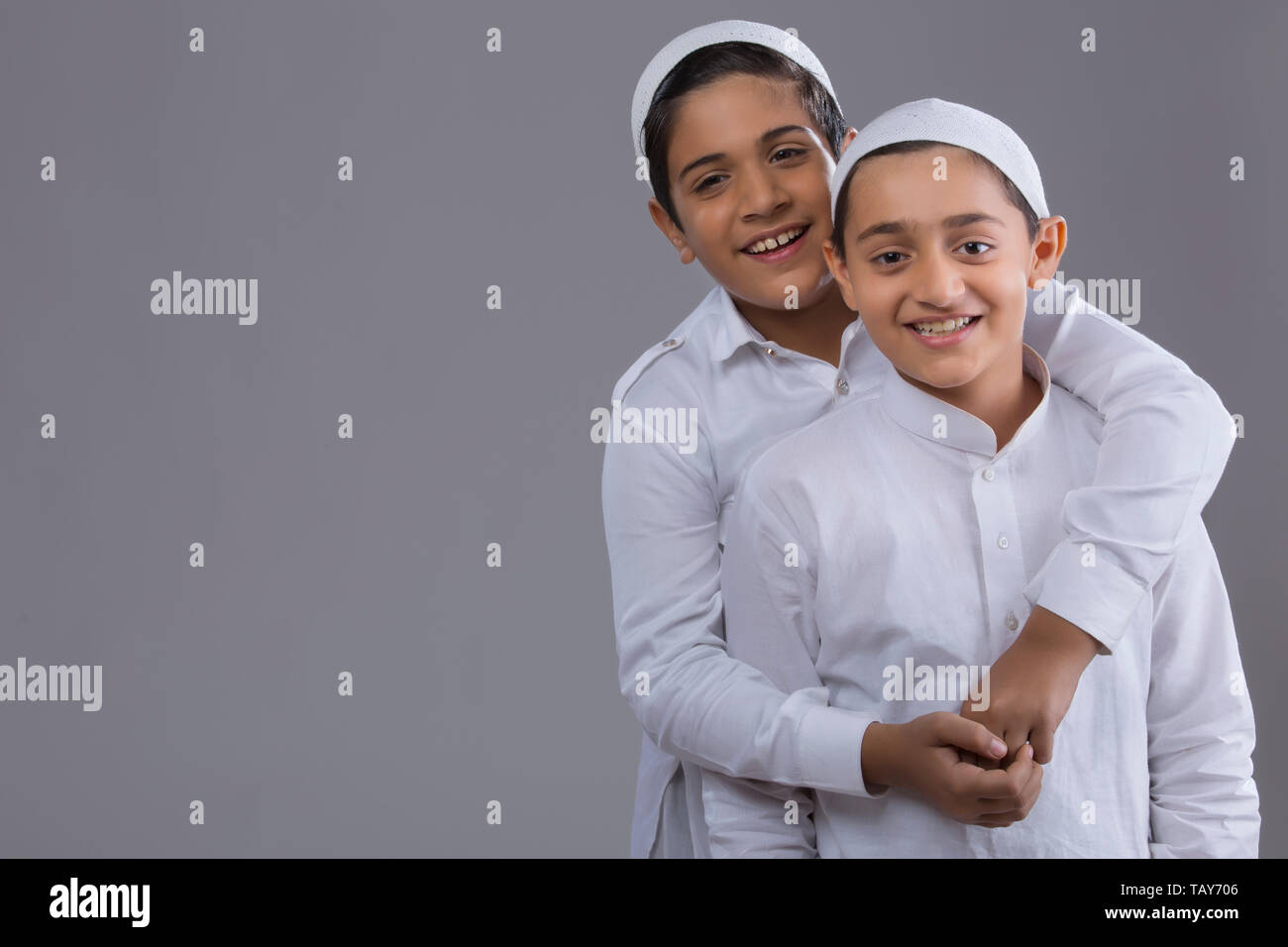 Indian two friends hugging smiling hi-res stock photography and images ...