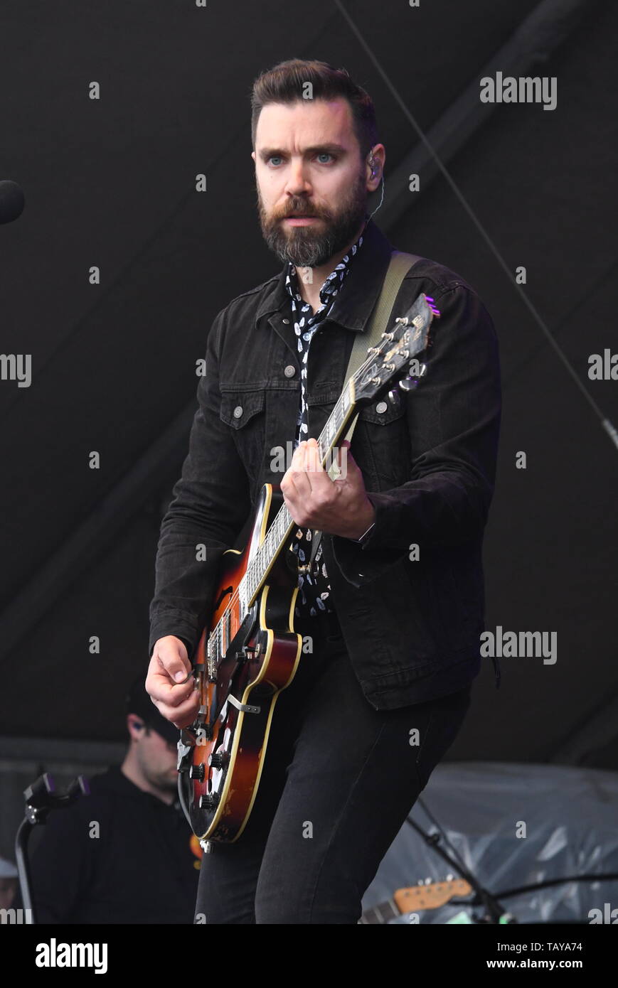 Singer, songwriter and guitarist Ben Schneider is shown performing on ...