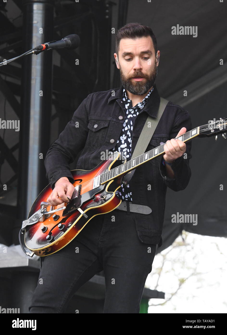 Singer, songwriter and guitarist Ben Schneider is shown performing on ...