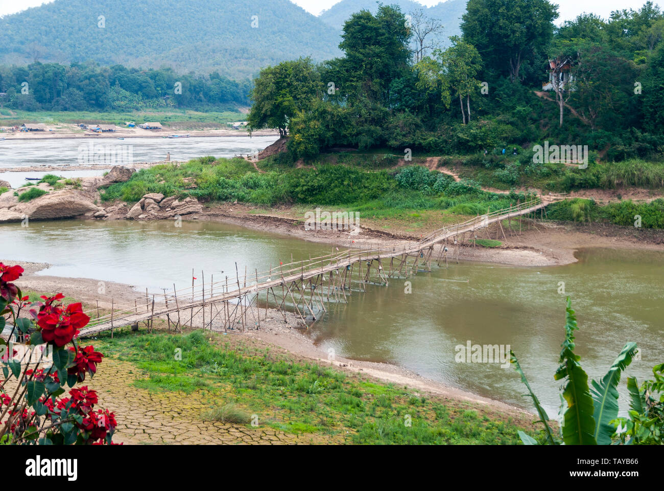 Small wooden Monkey bridge in Luang Prabang, Laos Stock Photo - Alamy