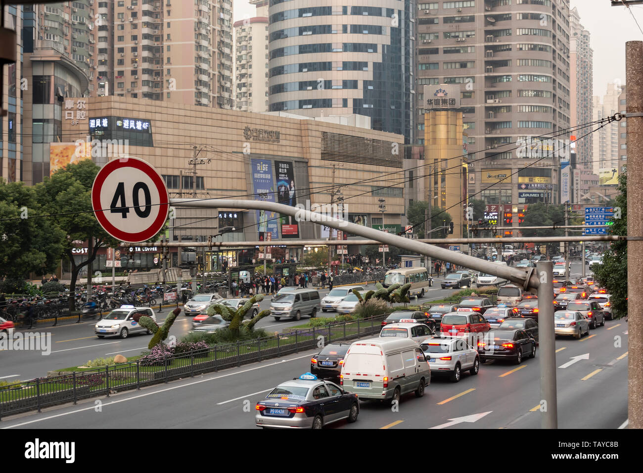 Evening Street Scene in Shanghai China with Houses and Shops Stock ...