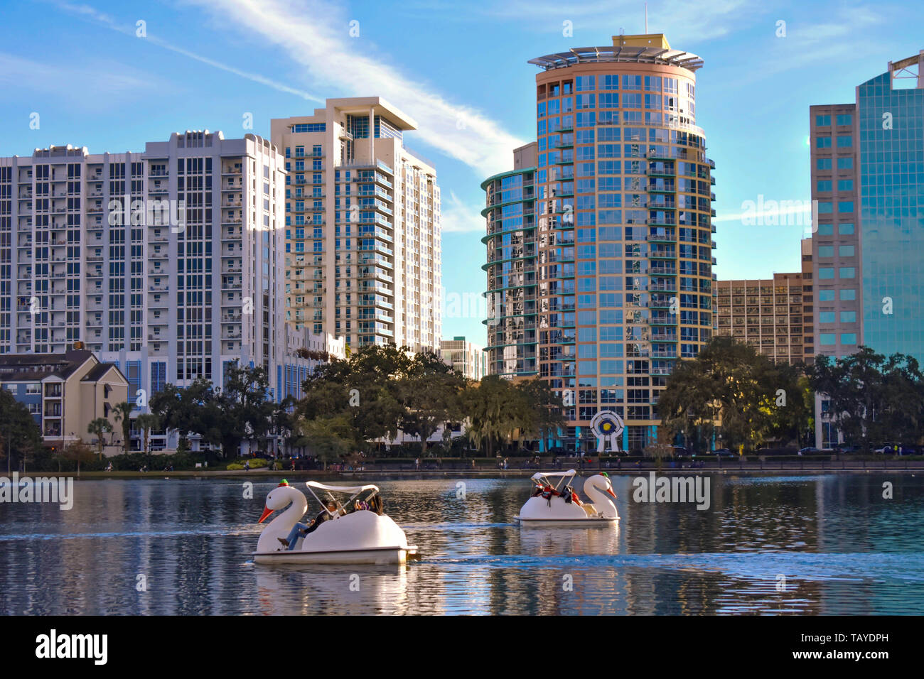 Orlando, Florida . December 24, 2018. Colorful buildings and swan boats ...