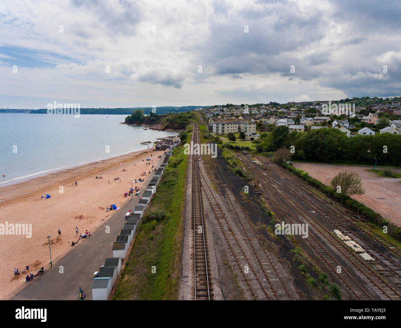 Aerial View of a empty steam railway line in Devon coastline on a ...