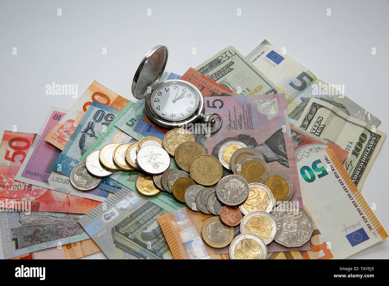 A composition with various country banknotes and coins Stock Photo - Alamy