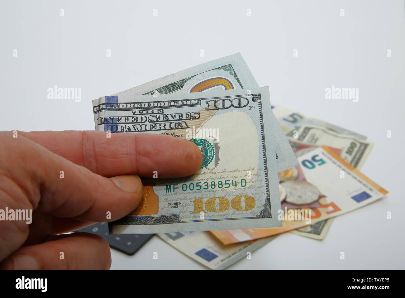 A composition with various country banknotes and coins Stock Photo - Alamy