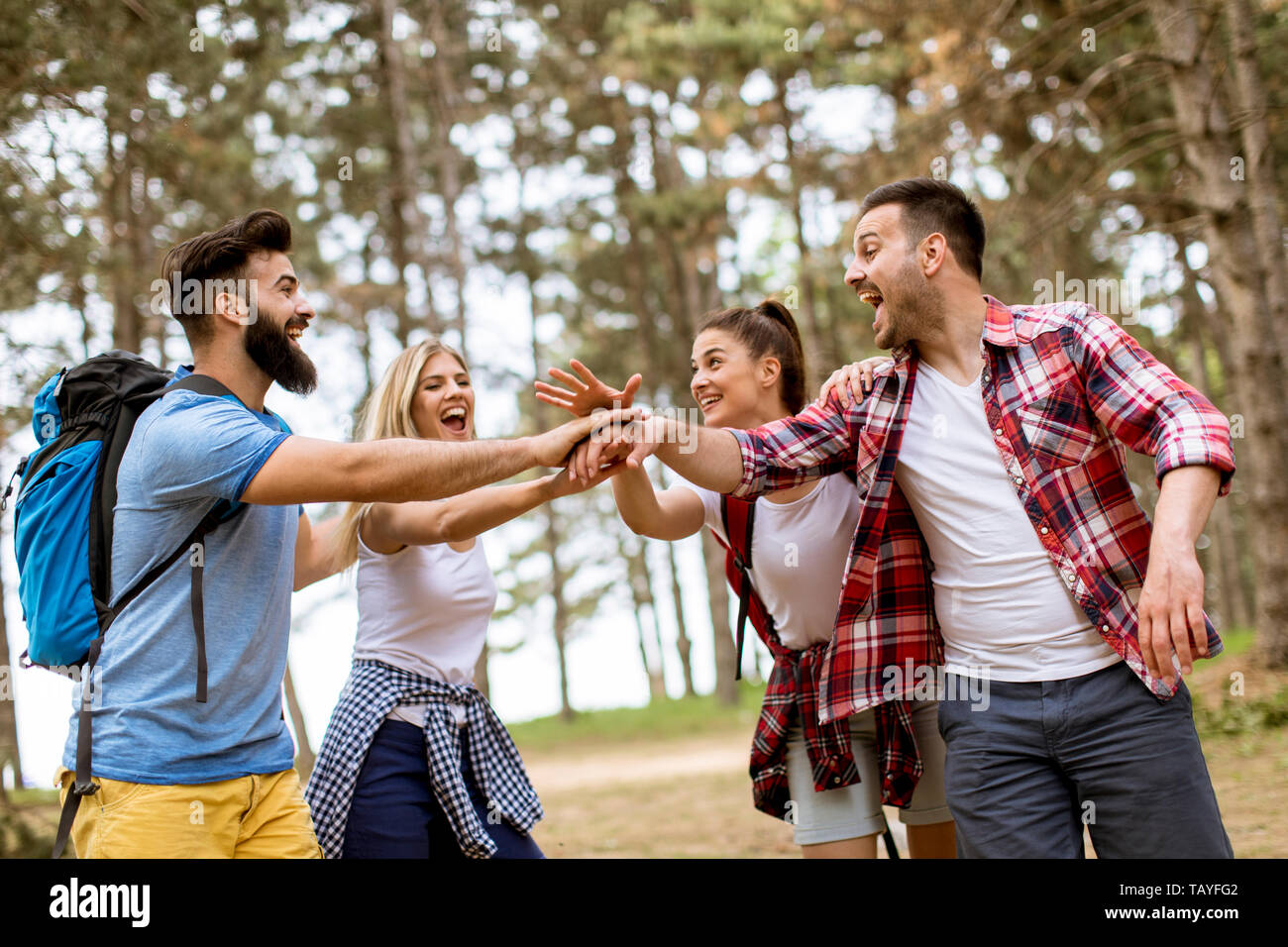 Young people hiking hi-res stock photography and images - Alamy