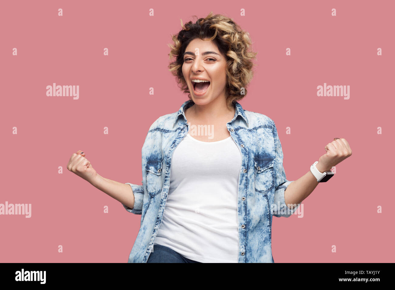 Happy cheering hi-res stock photography and images - Alamy