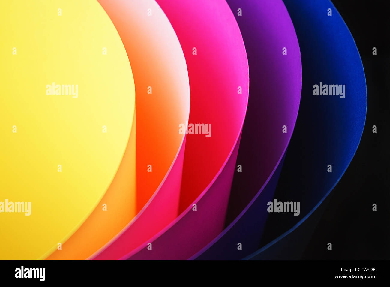 Trendy neon multicolor background from a cardboard of different colors ...